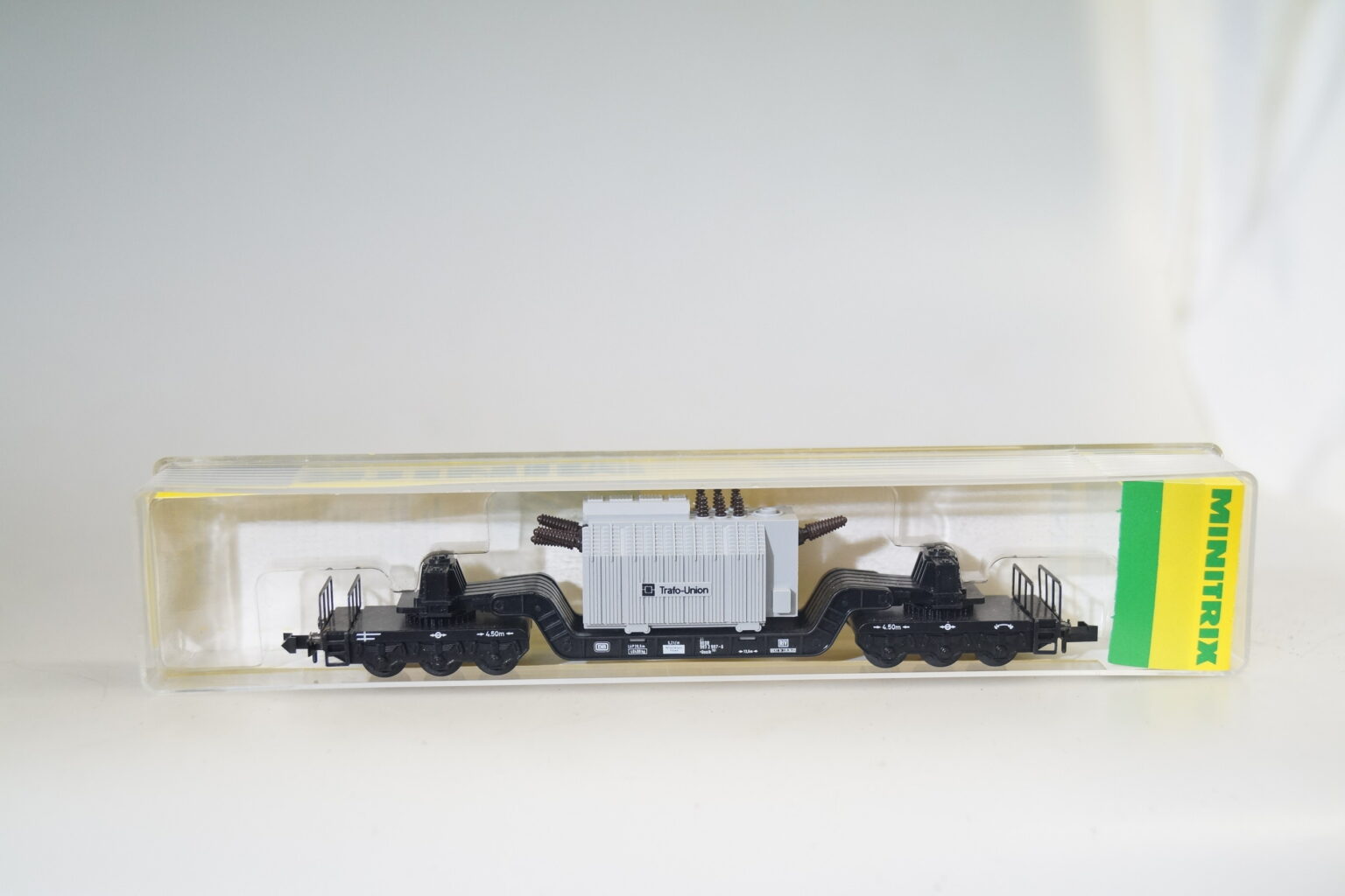 Spur N: Minitrix 13298 Tiefladewagen mit Trafo, top/ovp – gearontologist