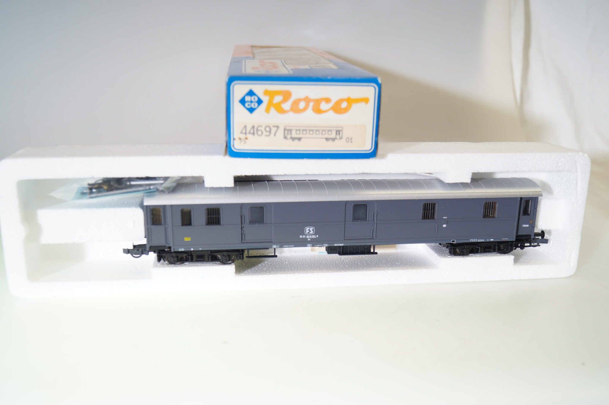 h0 Roco 44697 Postwagen FS, neuw./ovp/KK - gearontologist