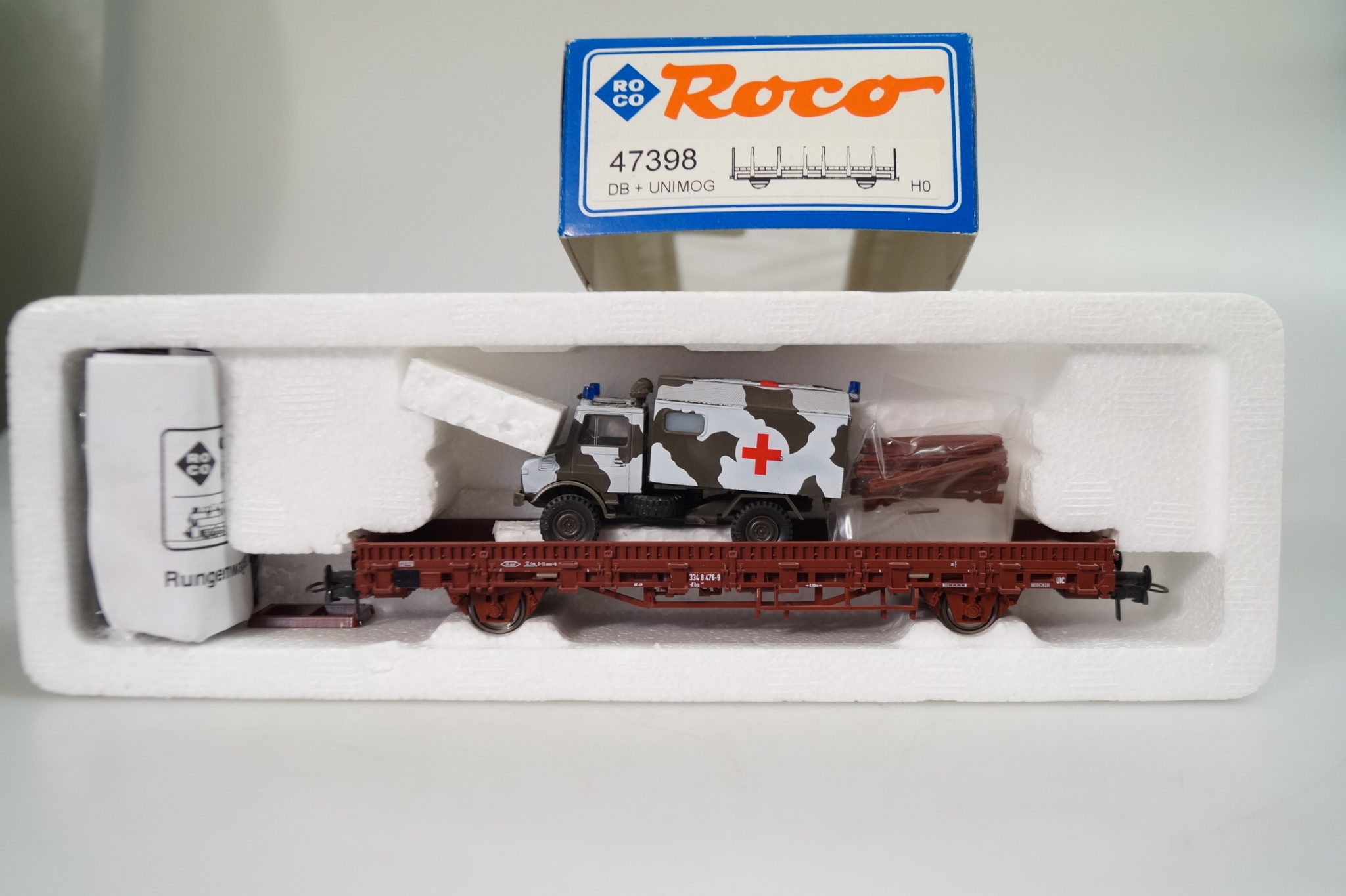 H0 Roco 47398 Niederbordwagen + Unimog Wintertarn Minitanks, neu ...